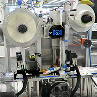 Labeling round snus and nicotine pouches tins | HERMA